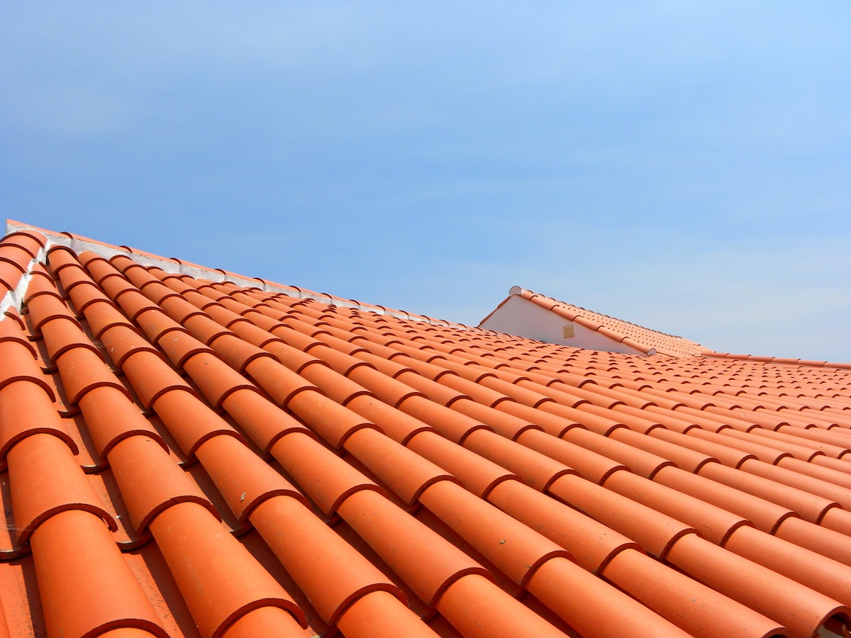 Slate Vs Tile Roof Compared: Style, Durability, & More